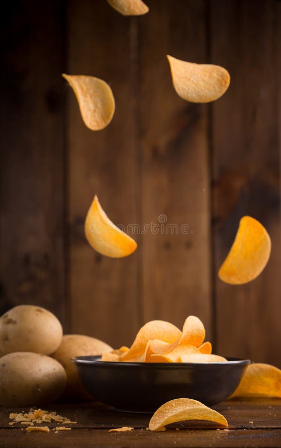Potato chips falling stock image. Image of background - 203128831