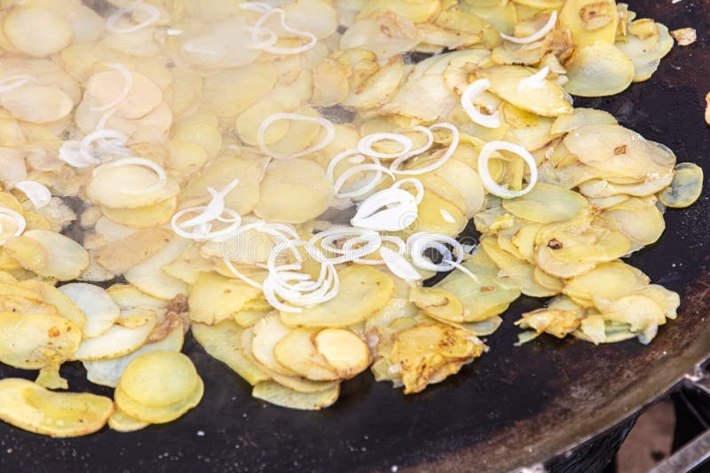 Potato Chips are Fried in a Frying Pan in Oil Stock Image - Image of ...