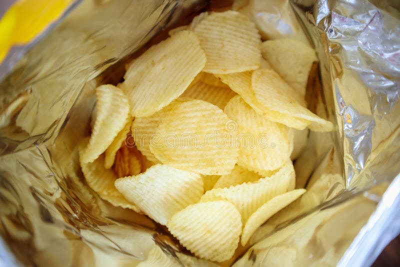 Potato Chips in Open Snack Bag Closeup Stock Photo - Image of crisps ...