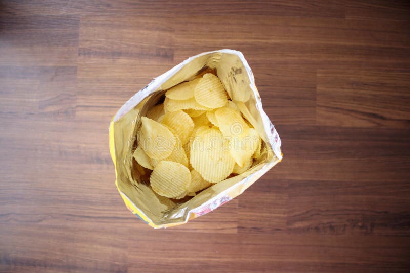 Open bag with potato chips stock image. Image of tasty - 75069027