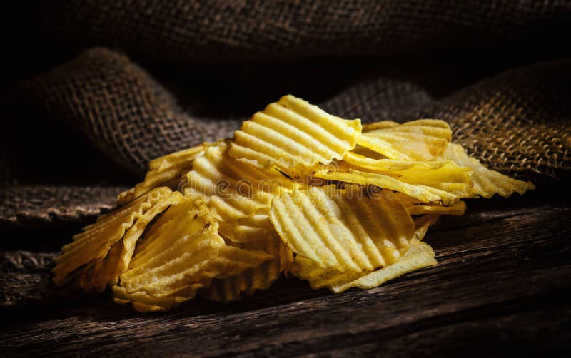 Potato Chips on Rustic Wooden Table Stock Image - Image of meal ...