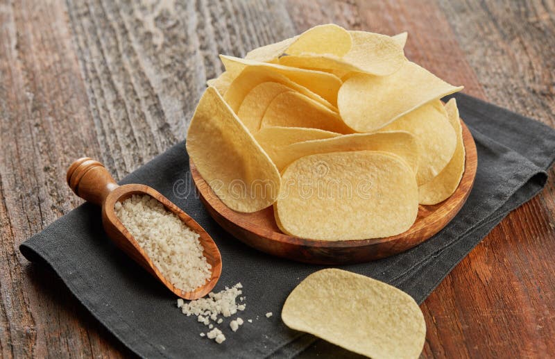 Potato chips with salt stock photo. Image of chips, potato - 127960398