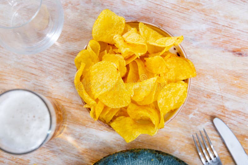 Potato Chips Served with Glass of Beer Stock Photo - Image of products ...