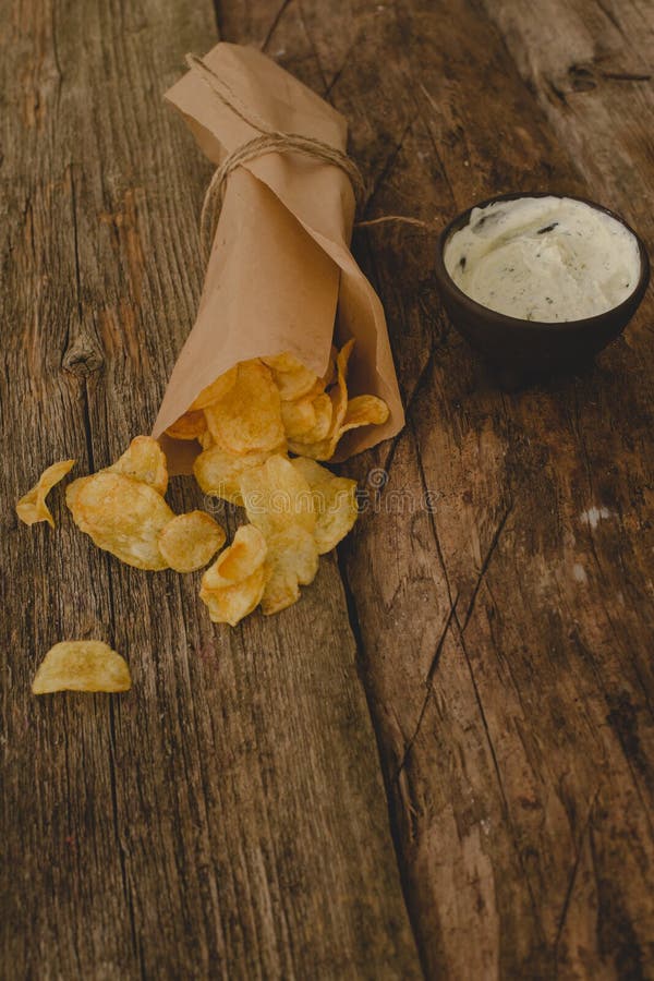 Potato chips on the table stock image. Image of crisps - 46099451