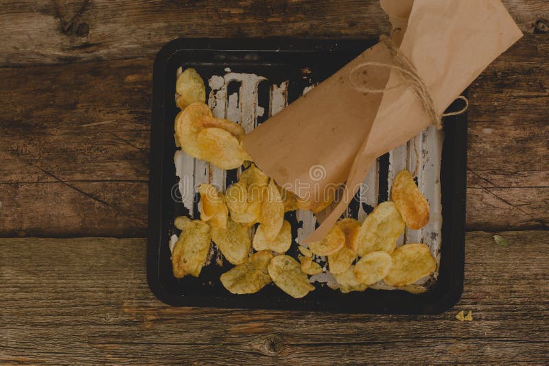Potato chips on the table stock photo. Image of salt - 46102174
