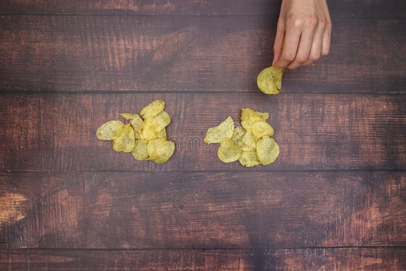 Potato Chips on Wooden Table Stock Image - Image of food, apple: 144096507