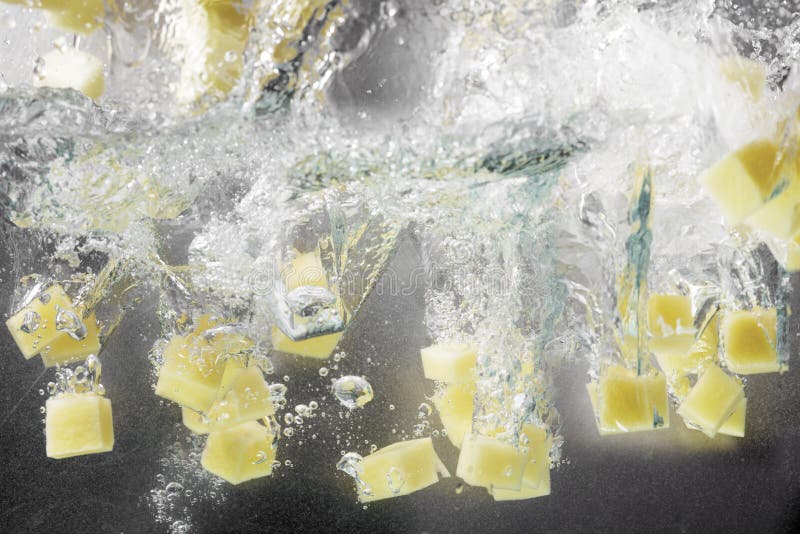 Potato cubes stock image. Image of splash, potatoes, splashing - 26380571