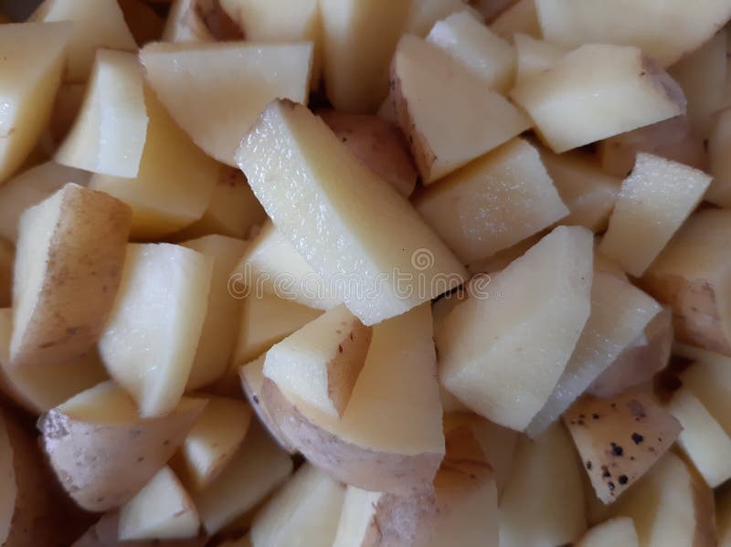 Potato Cutting . Lots of Two Cut Pieces Stock Photo - Image of ...