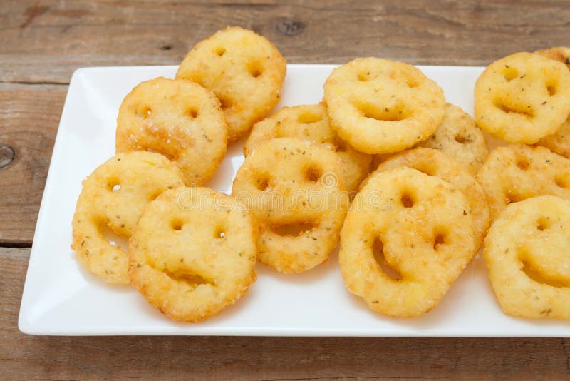 Potato fried smileys chips stock photo. Image of heap - 76475020