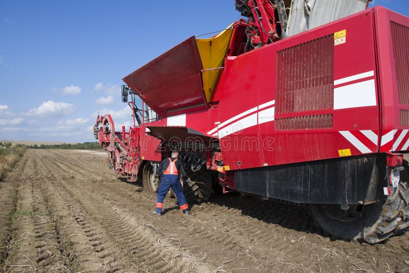 Potato harvester machine editorial image. Image of rural - 231095560