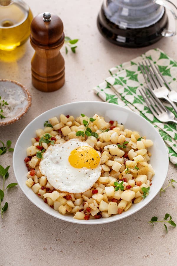 Potato Hash with Pancetta Topped with a Fried Egg Stock Photo - Image ...