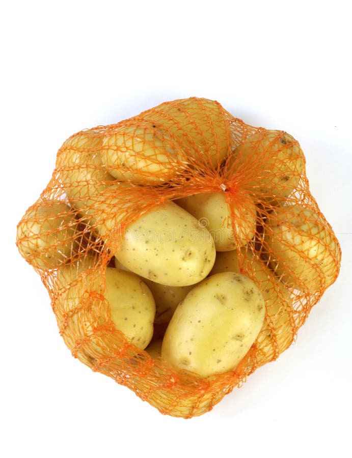 Net of potatoes stock photo. Image of onions, stall - 219564684