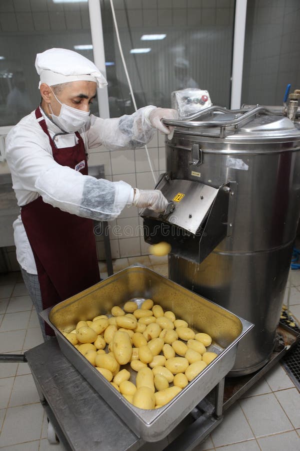 Potato peeling machine. editorial image. Image of peel - 23628955