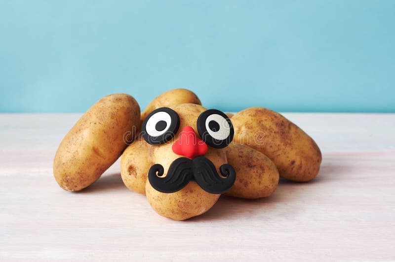 Potato Portrait on a Green Background Stock Photo - Image of emotions ...