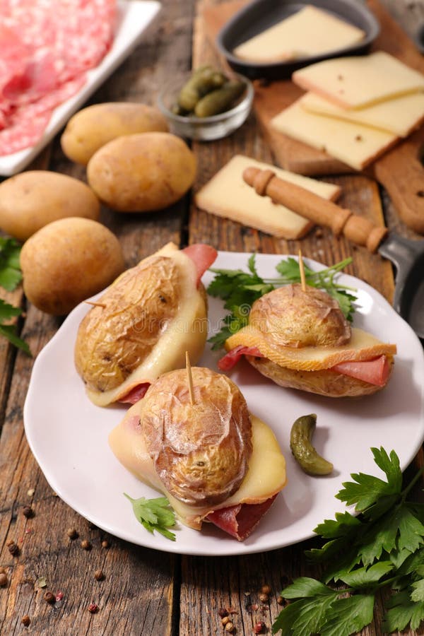 Potato and raclette cheese stock photo. Image of culinary - 131997802