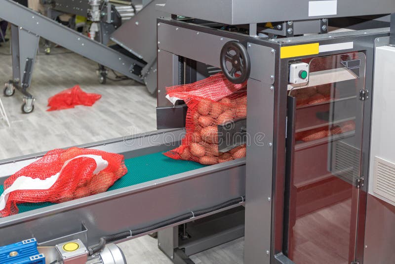 Potato Sacks Machine stock photo. Image of equipment - 195619278