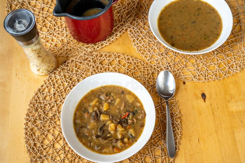 Potato Soup with Mushroom and Vegetable, Pot,spoon and Salt on Table ...