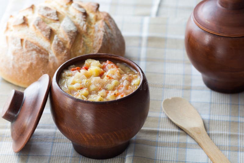 Potato and Vegetables Stew Cooked in Clay Pot on the Table Stock Photo ...