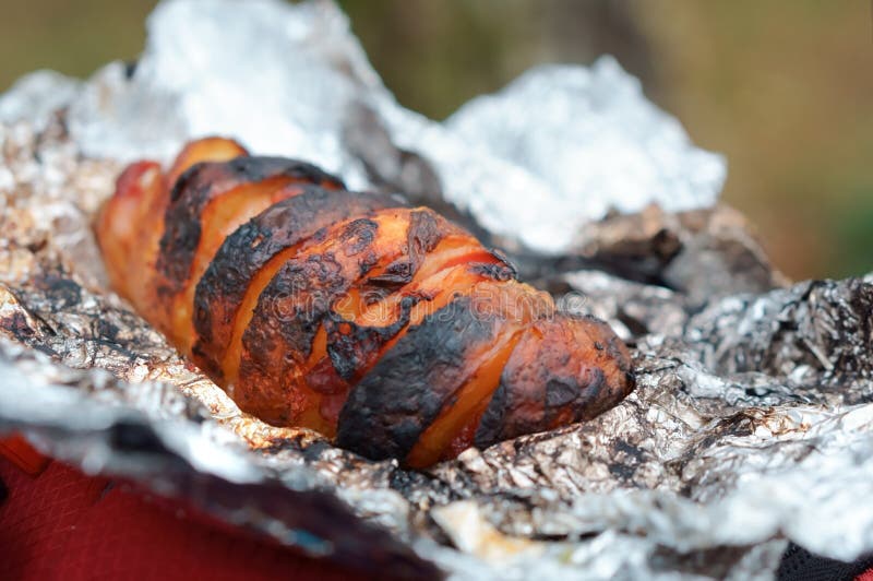 Potatoes Baked on the Fire, Zegetables in Foil in the Fire Stock Image ...