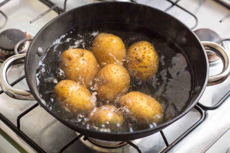 Potatoes Boiling in a Saucepan on a Gas Hob Stock Image - Image of ...