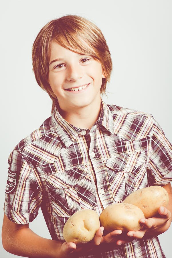 Potatoes child stock photo. Image of young, vegan, male - 44384622