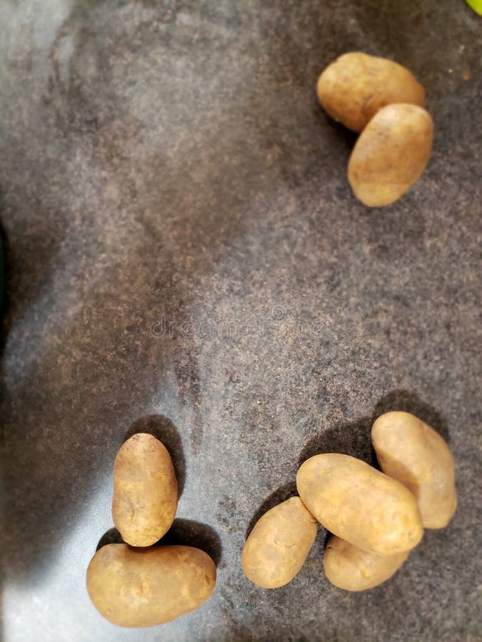 Potatoes on a countertop stock image. Image of potato - 122157247