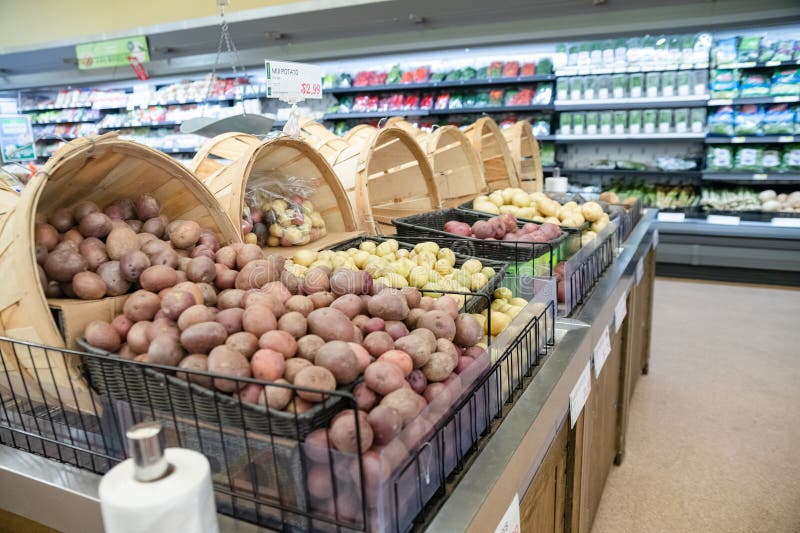 Potatoes and Other Vegetables on the Supermarket Counter Stock Photo ...