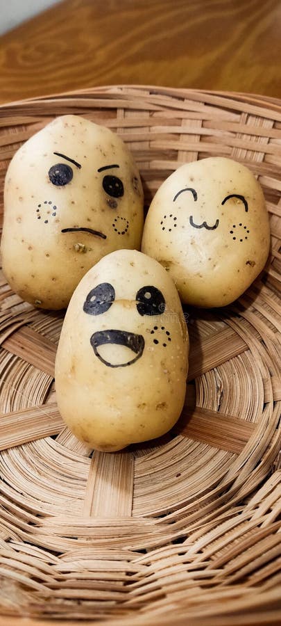 3 Potatoes Reacting with Different Facial Stock Photo - Image of craft ...