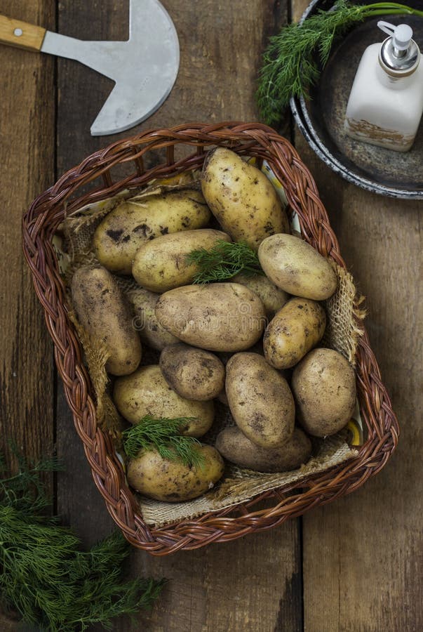 Potatoes on a Rustic Background Stock Photo - Image of lunch, food ...