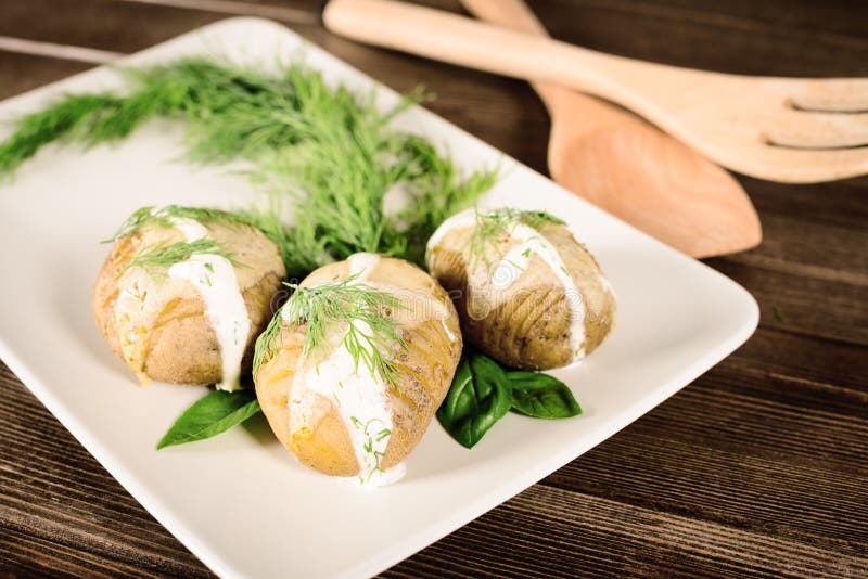 Potatoes are Served on Dish with Basil Sauce and Fennel Stock Image ...