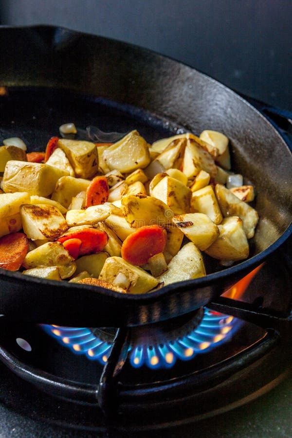 Potatoes in Skillet Over a Fire. Stock Image - Image of traditional ...