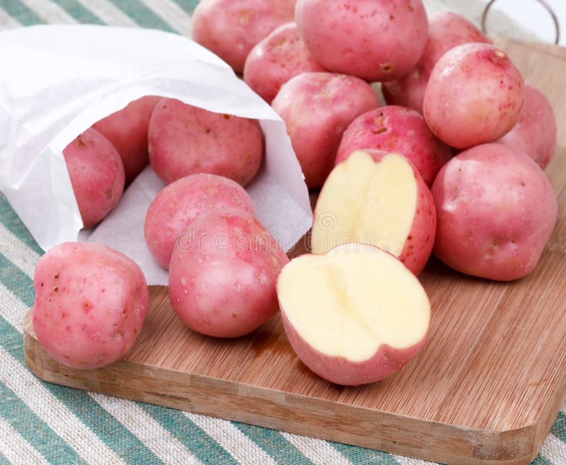 Potatoes on the table stock image. Image of potato, isolated - 10544517