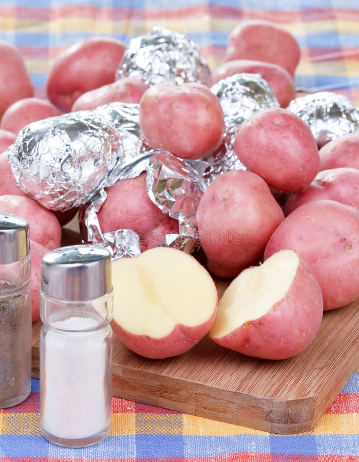 Potatoes on the table stock image. Image of isolated - 11055395
