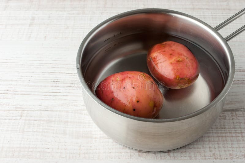 Potatoes in Water in a Metal Pan Horizontal Stock Image - Image of ...