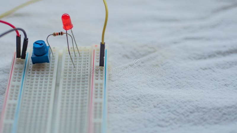 Potentiometer, Resistors and Red LED Set Up on a Breadboard Stock Image ...