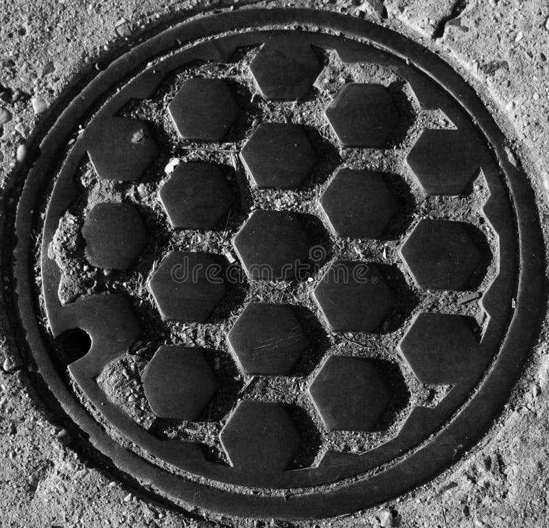 Pothole Cover Abstract in Monochrome Stock Photo - Image of monochrome ...