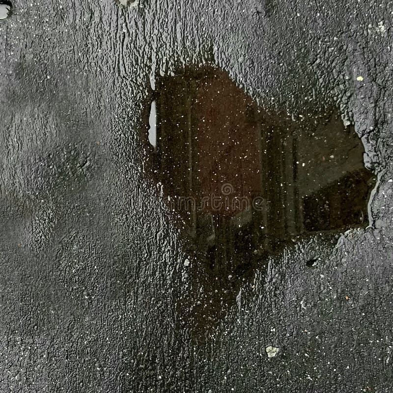 Pothole Filled with Water, Puddle Heart Shape, with Reflection Stock ...