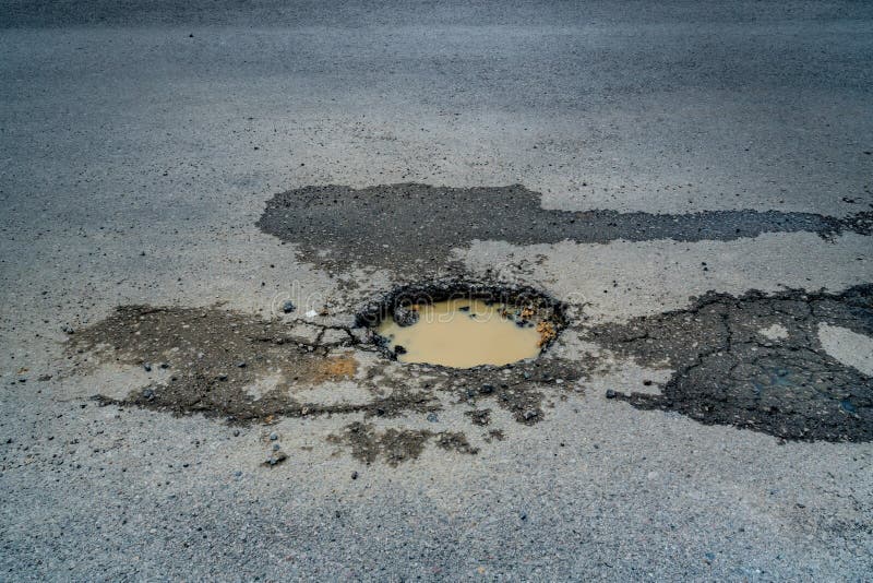 Pothole on the road stock photo. Image of broken, safety - 100267286