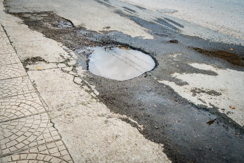 Pothole on the road stock image. Image of asphalt, surface - 81217095