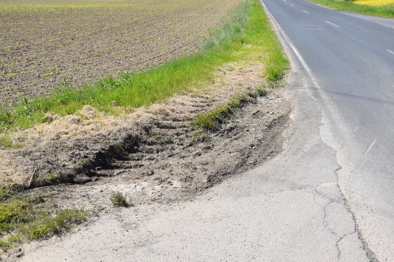 Pothole with tractor track stock photo. Image of lawn - 278598678