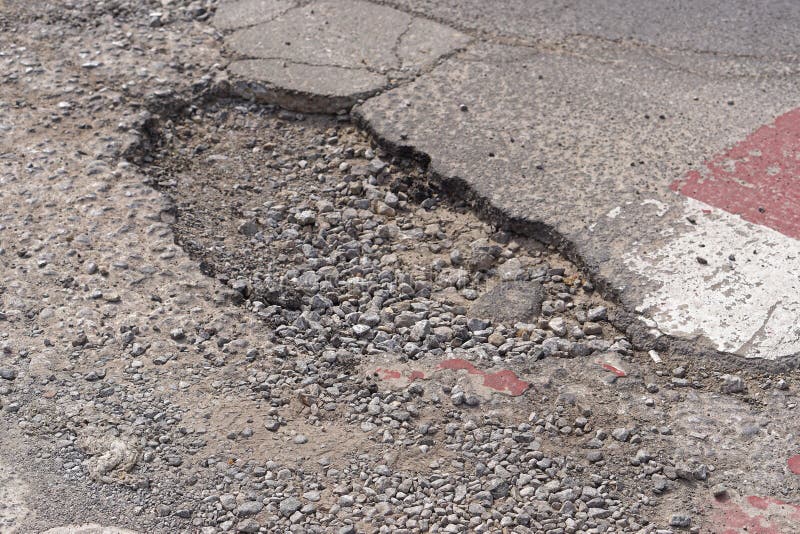 Pothole stock photo. Image of pothole, hole, depression - 197306076