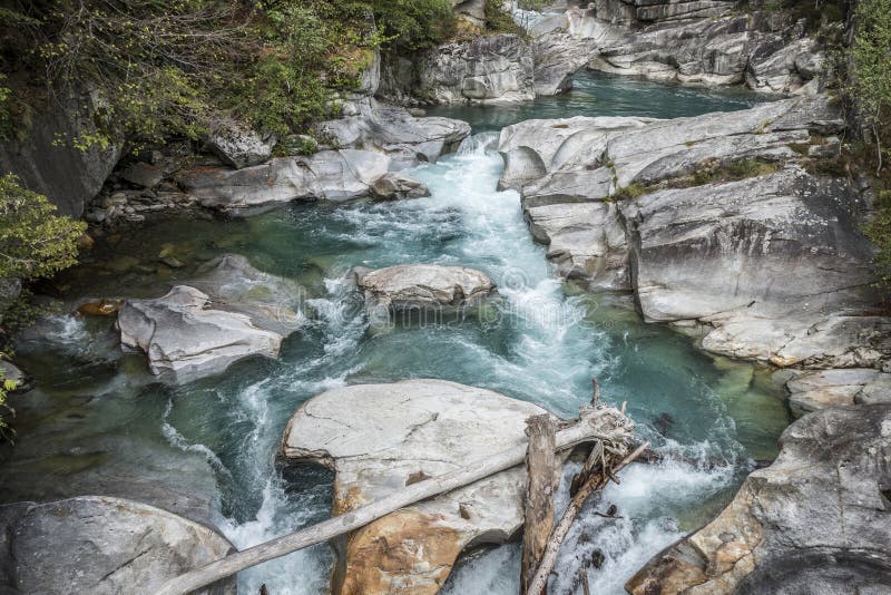 The Potholes of the Giants in the Toce River with Green Water and ...