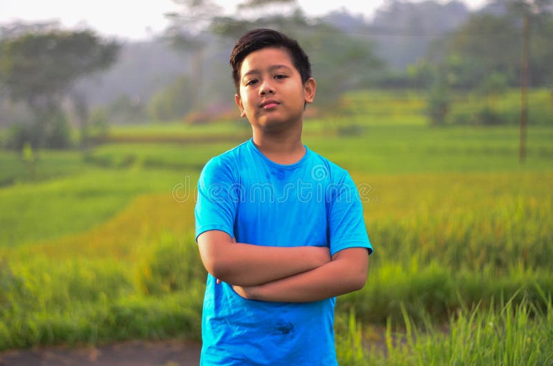 Potrait of Handsome Asian Boy with Cool in the Rice Field Stock Photo ...