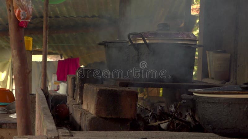 Pots Over a Smokey Fire Inside Stock Video - Video of cooking, boiling ...
