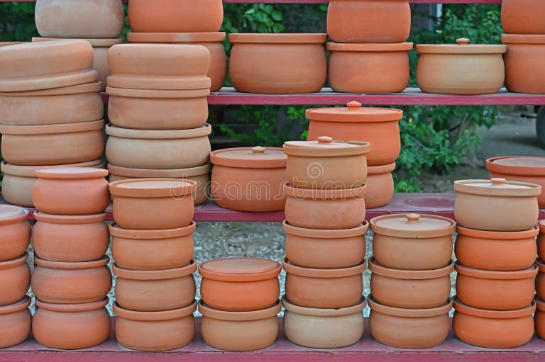 Pots of different sizes stock photo. Image of earthenware - 352485338