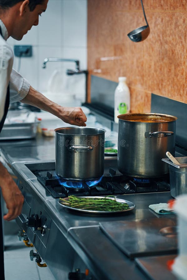 Pots on the Stove in a Professional Kitchen Stock Image - Image of pots ...