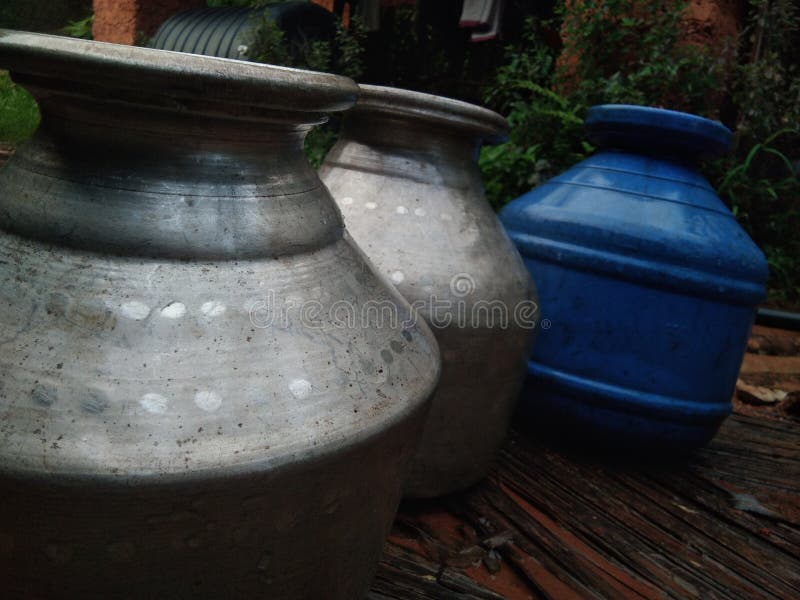 Pots with Water Boiling Over a Firewood. Ancient Cooking Utensils Used ...