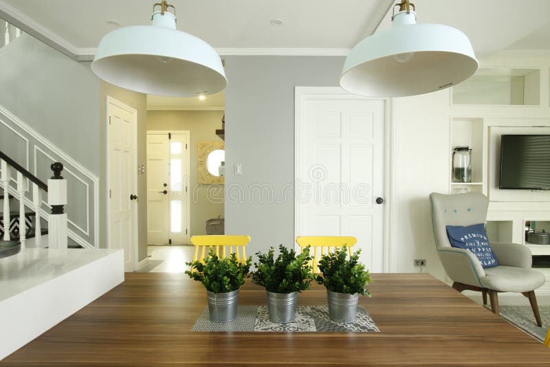Potted Plants on a Clean Wooden Kitchen Table in a Modern Home Stock ...