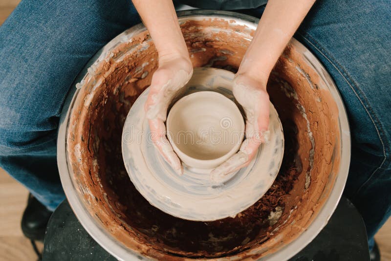 Potter Creates a Ceramic Bowl in the Pottery Studio. Process of Making ...