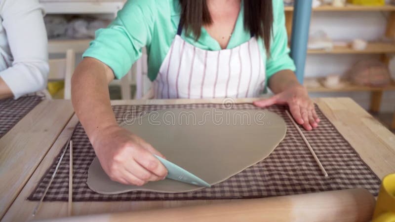 Potter Cutting Clay with Wire on Workbench Stock Footage - Video of ...